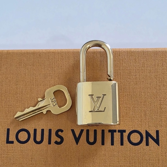 Louis Vuitton | Accessories | Louis Vuitton Authentic Lv Lock And Key ...